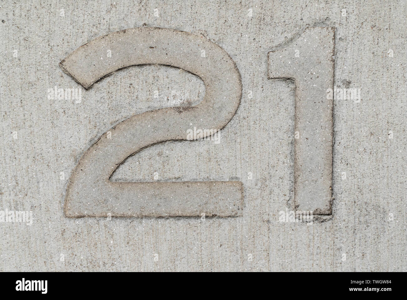 Twenty one number stamped on concrete background. Outdoor Stock Photo ...