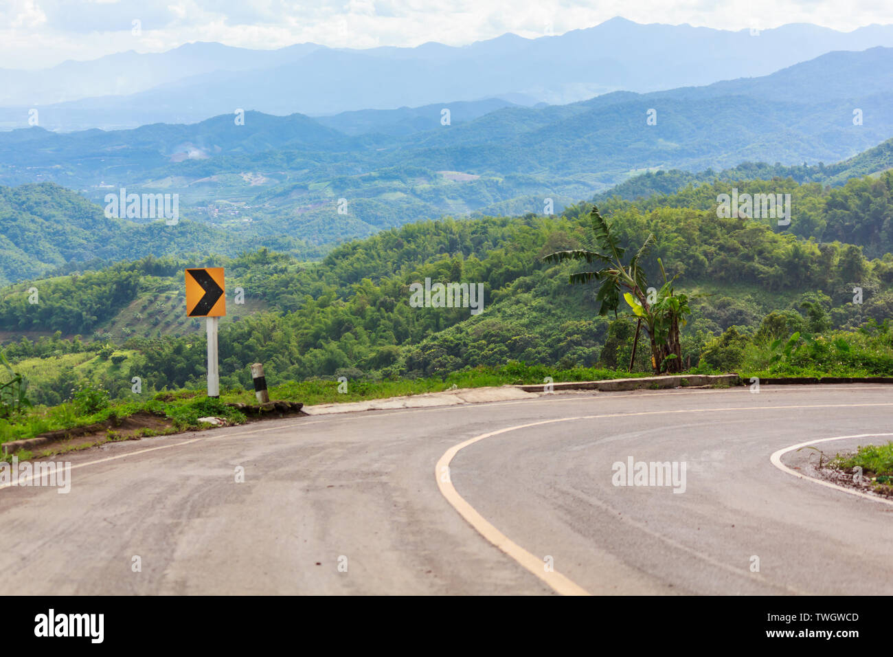 Traffic signs curve right direction on mountain highway, warning ...