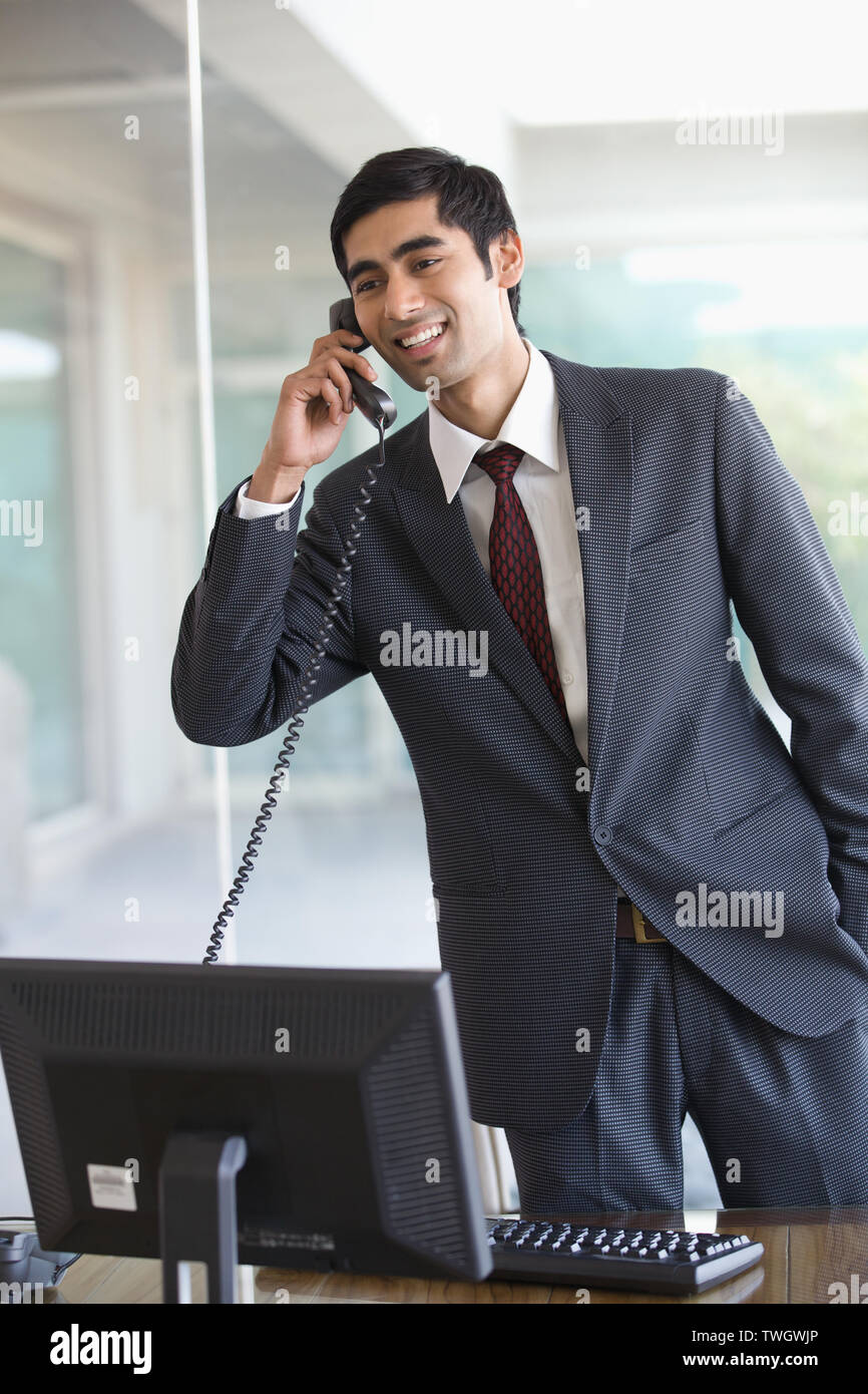 Employee using landline phone call hi-res stock photography and images ...