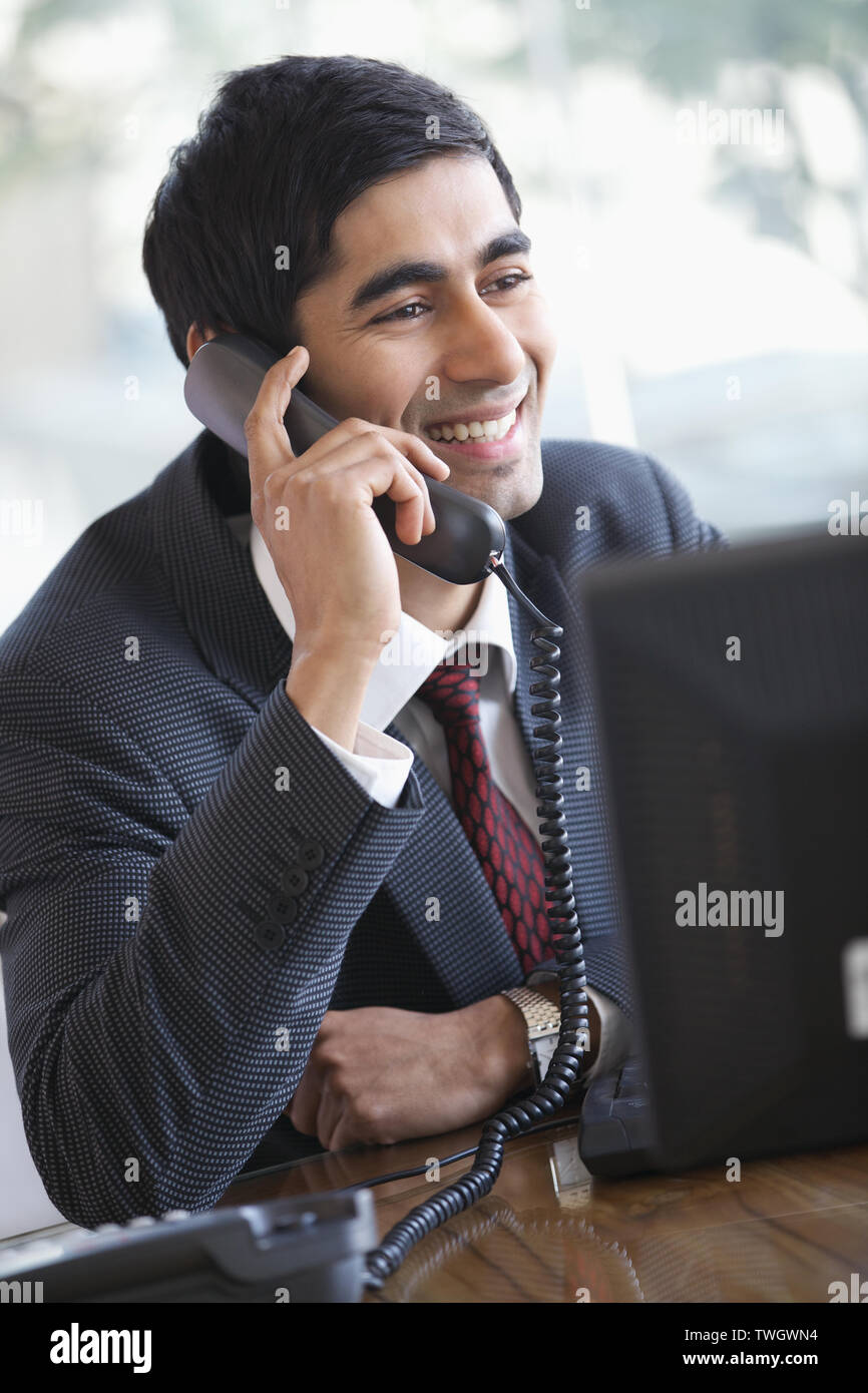 Employee using landline phone call hi-res stock photography and images ...