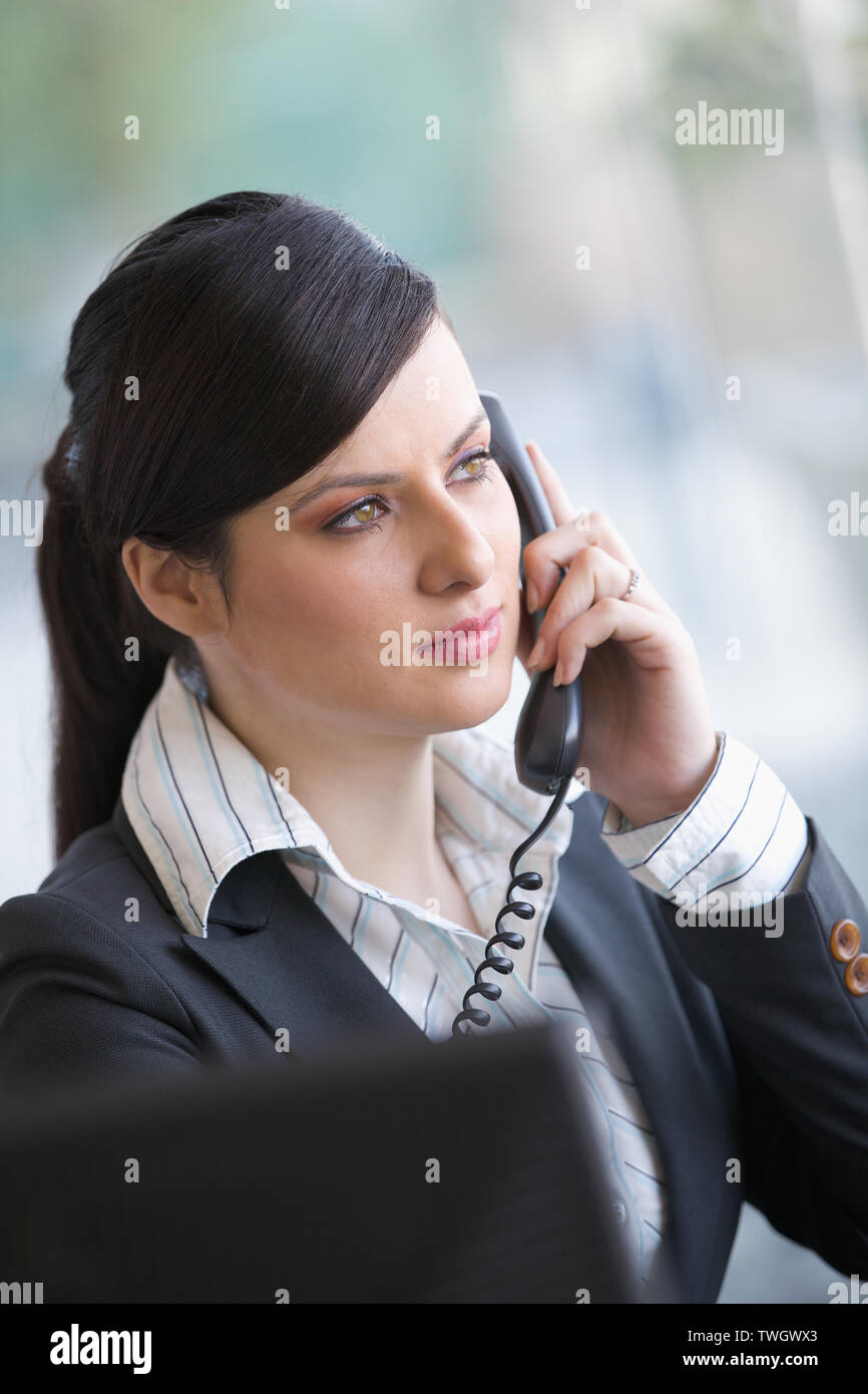 Employee using landline phone call hi-res stock photography and images ...