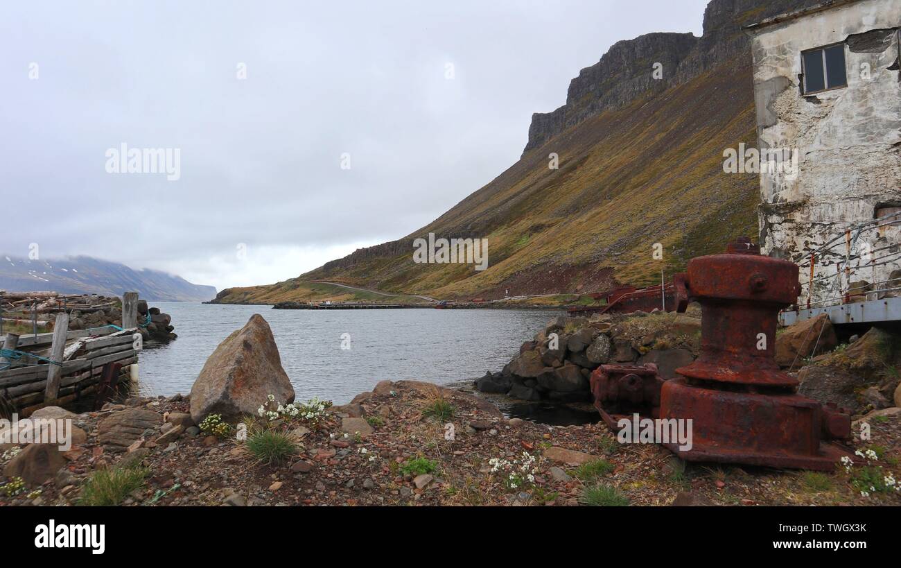 Rusty objects in front of a mountain landscape Stock Photo - Alamy