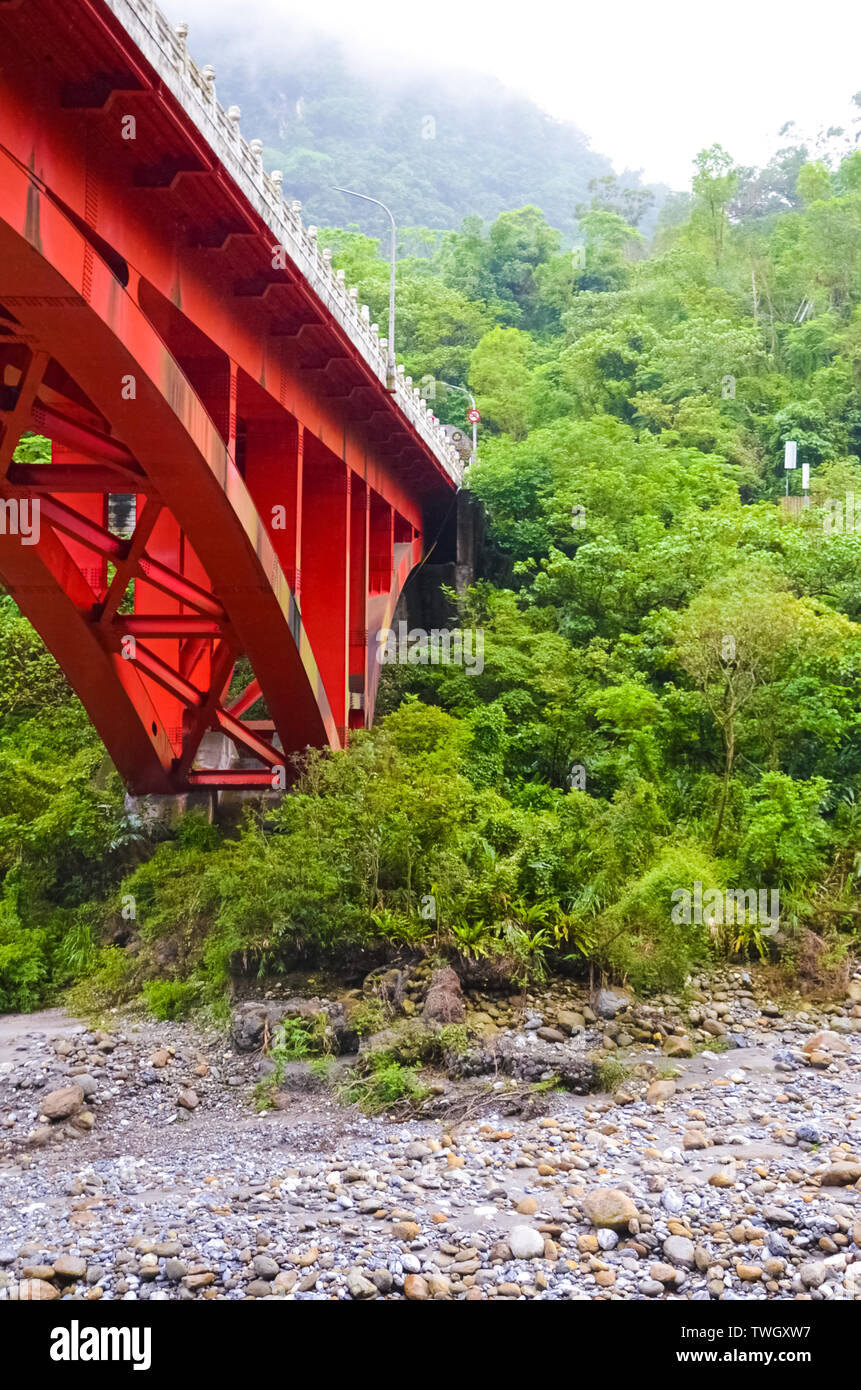 Vertical photo of red bridge in Taiwanese Taroko Gorge. Taroko National ...