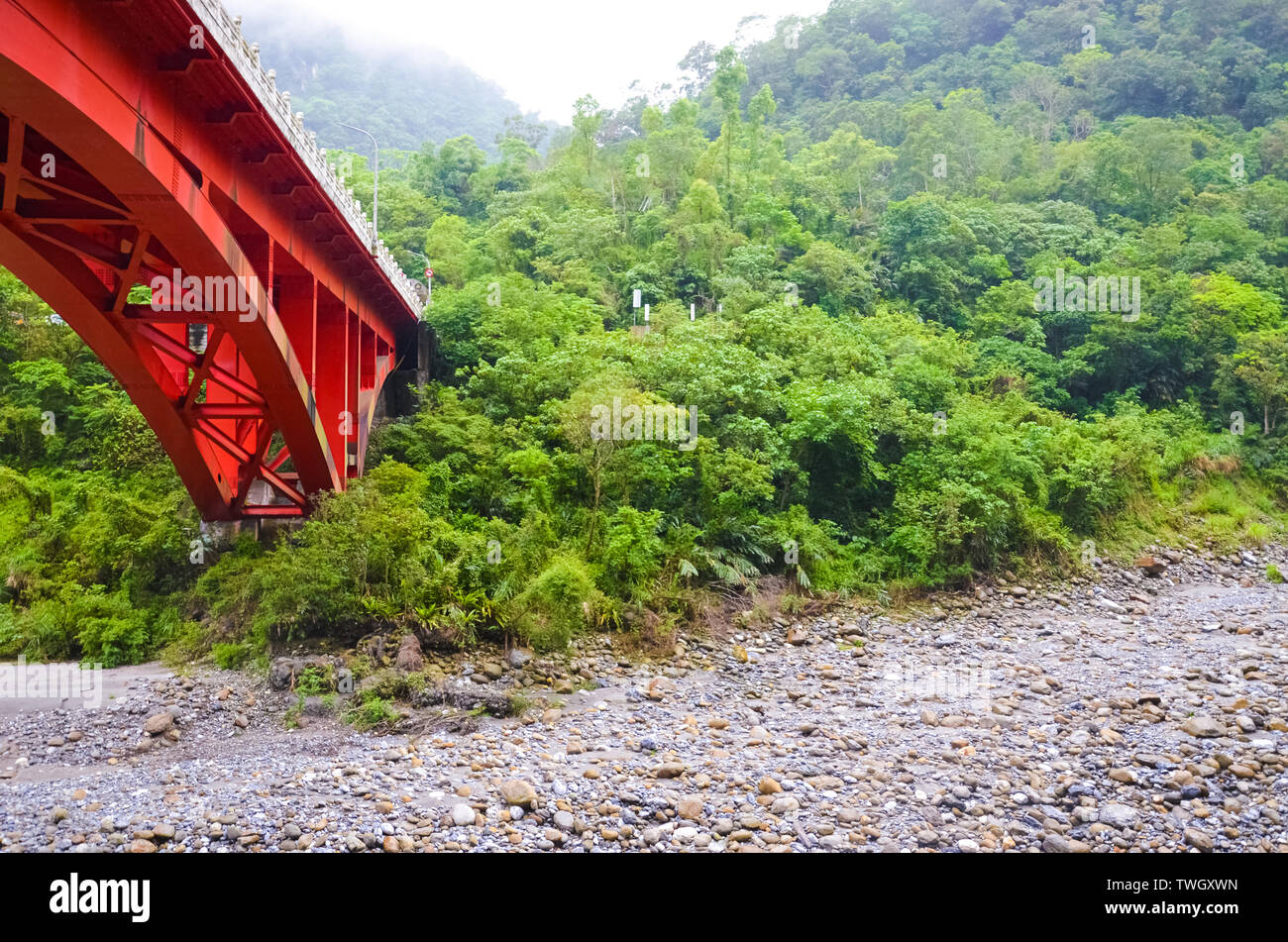 Red bridge over river bed in Taroko National Park, Taiwan. Taroko Gorge ...