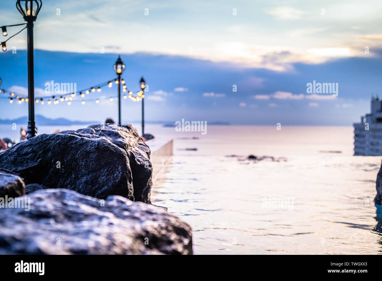 Amazing pink sunrise at infinity pool, Pattaya, Thailand Stock Photo ...