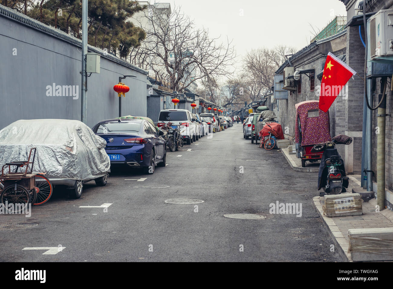 Street in traditional hutong residential area in Dongcheng district of ...