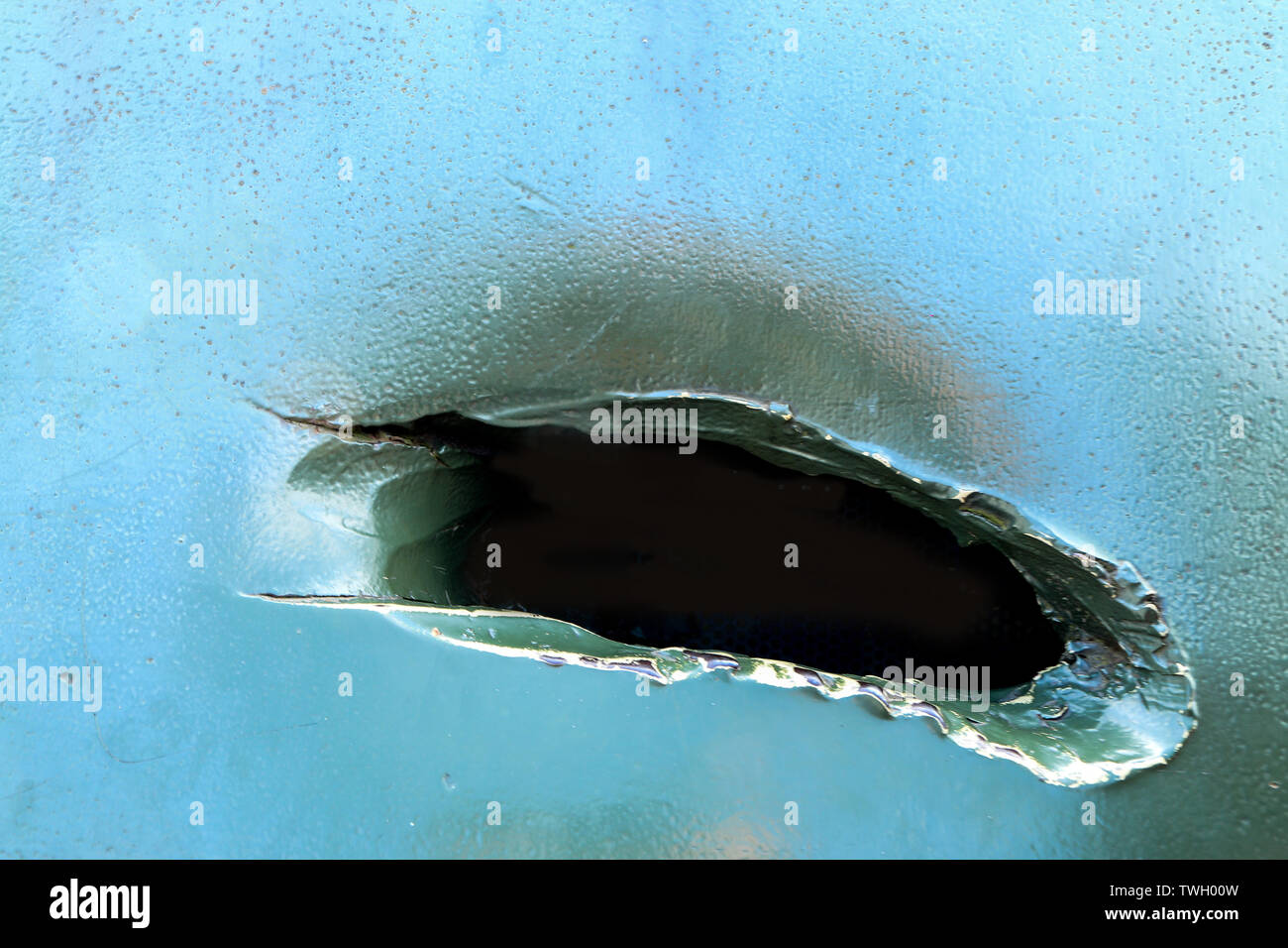 The bullet hole in the armor of the tank from second world war. It was ...