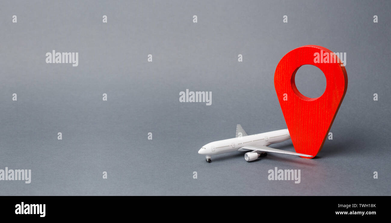 Red position pin and passenger airliner. Air travel and tourism, travel ...