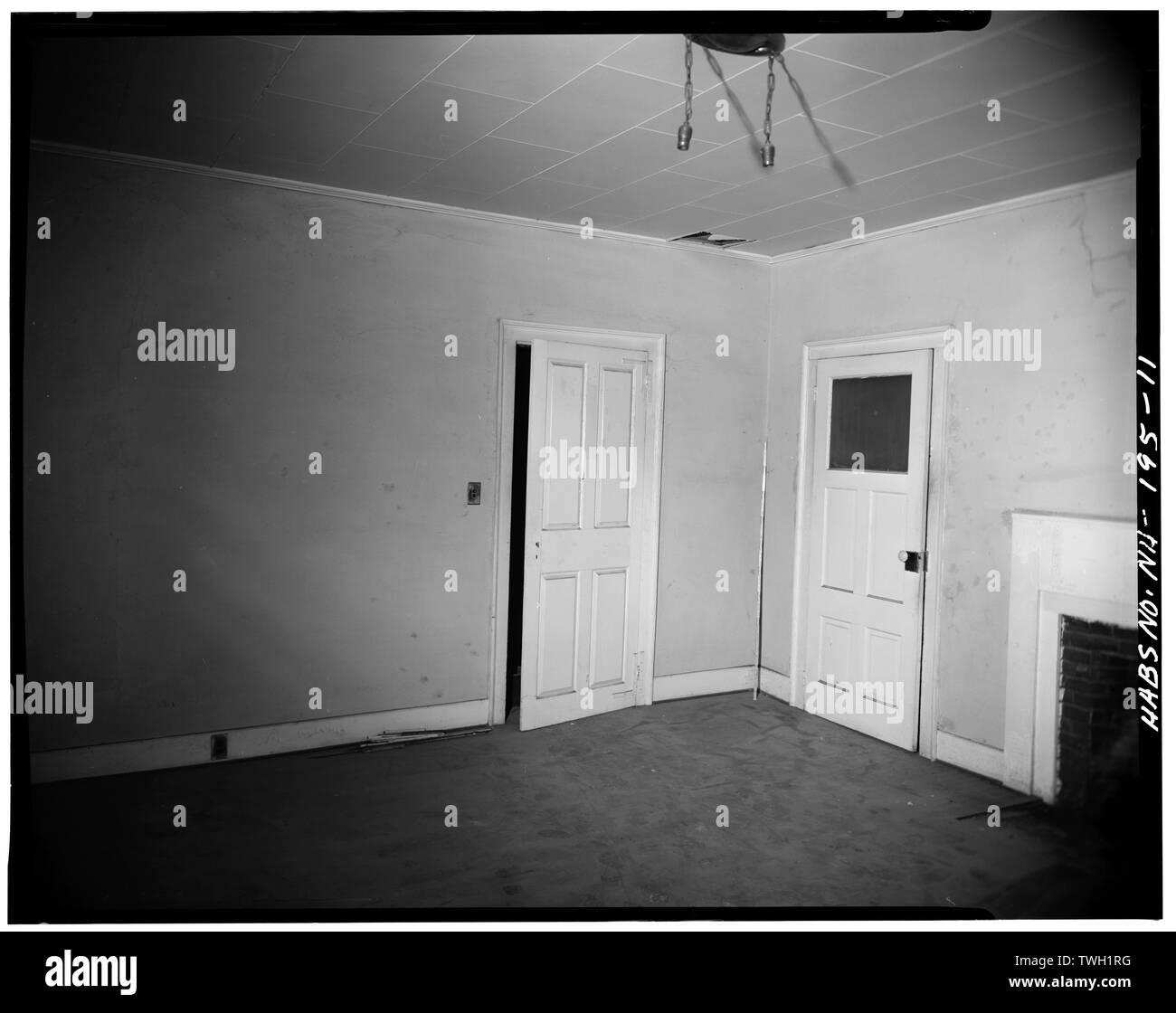 Rear room (Room 4) on west side of first floor, looking southeast ...