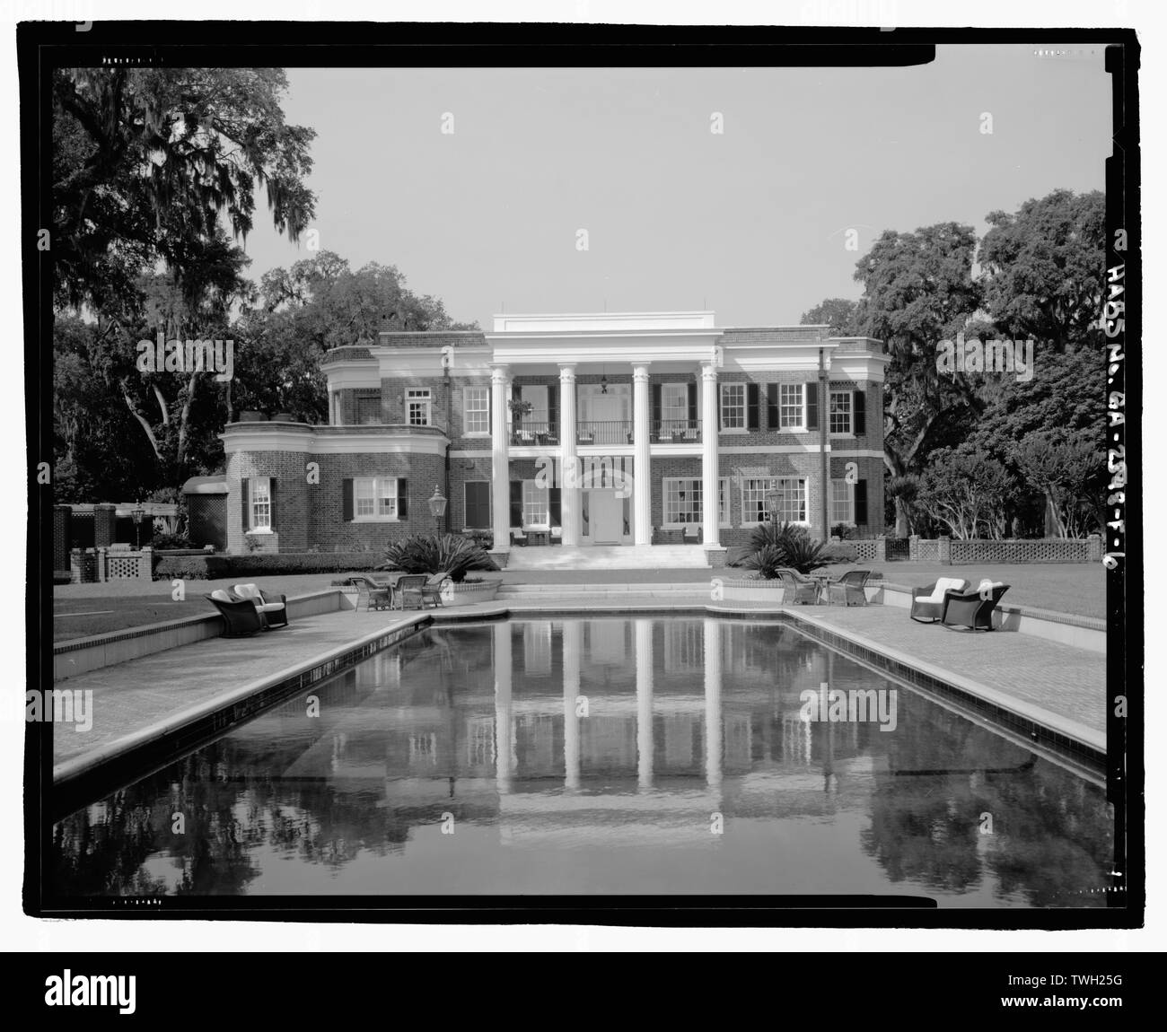 Rear view of Ford Mansion looking southwest with mansion reflection in ...