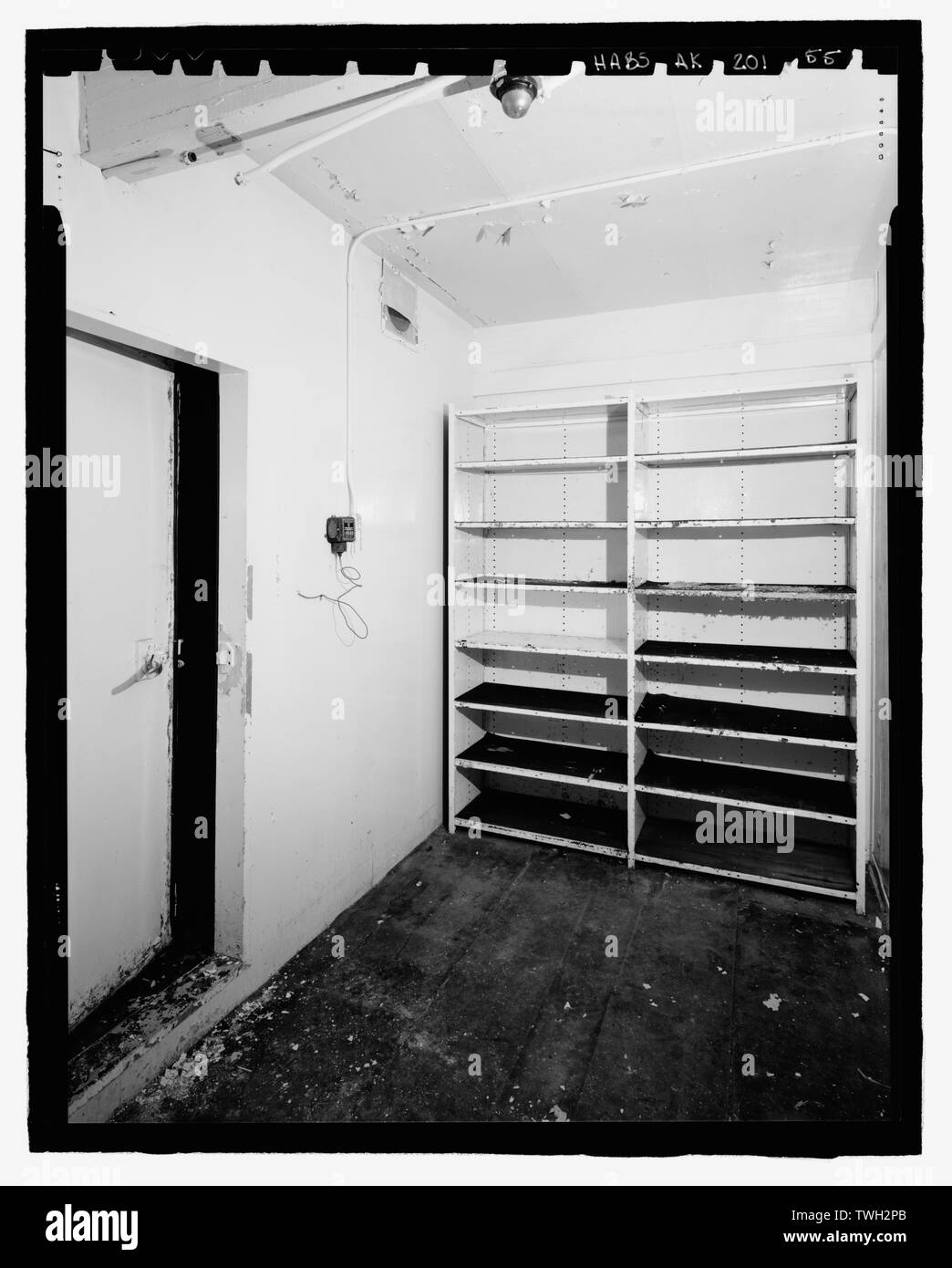 Refrigerator on way into freezer, Building 6, looking northeast - POW-3 ...