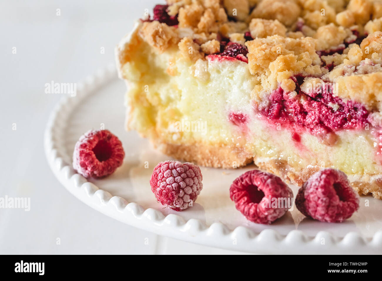 Shortcrust raspberries pie with crumble on white background Stock Photo ...
