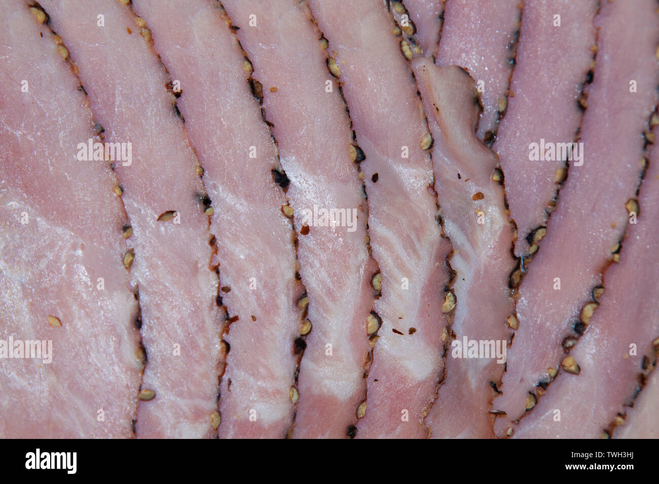 Pork ham with pepper Stock Photo - Alamy