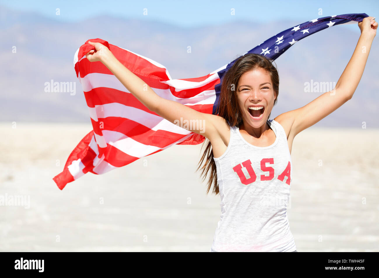 American flag - woman USA sport athlete winner cheering waving US flag ...