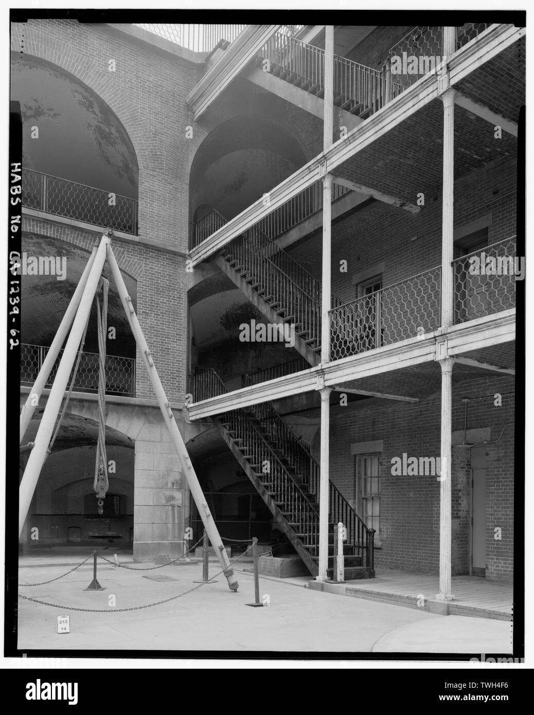 Rich ironwork detail in stairs and columns at the east corner of the ...
