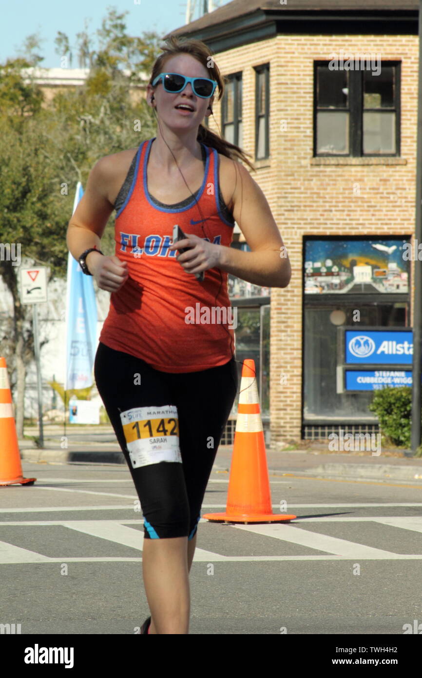 Female marathon runner Stock Photo - Alamy