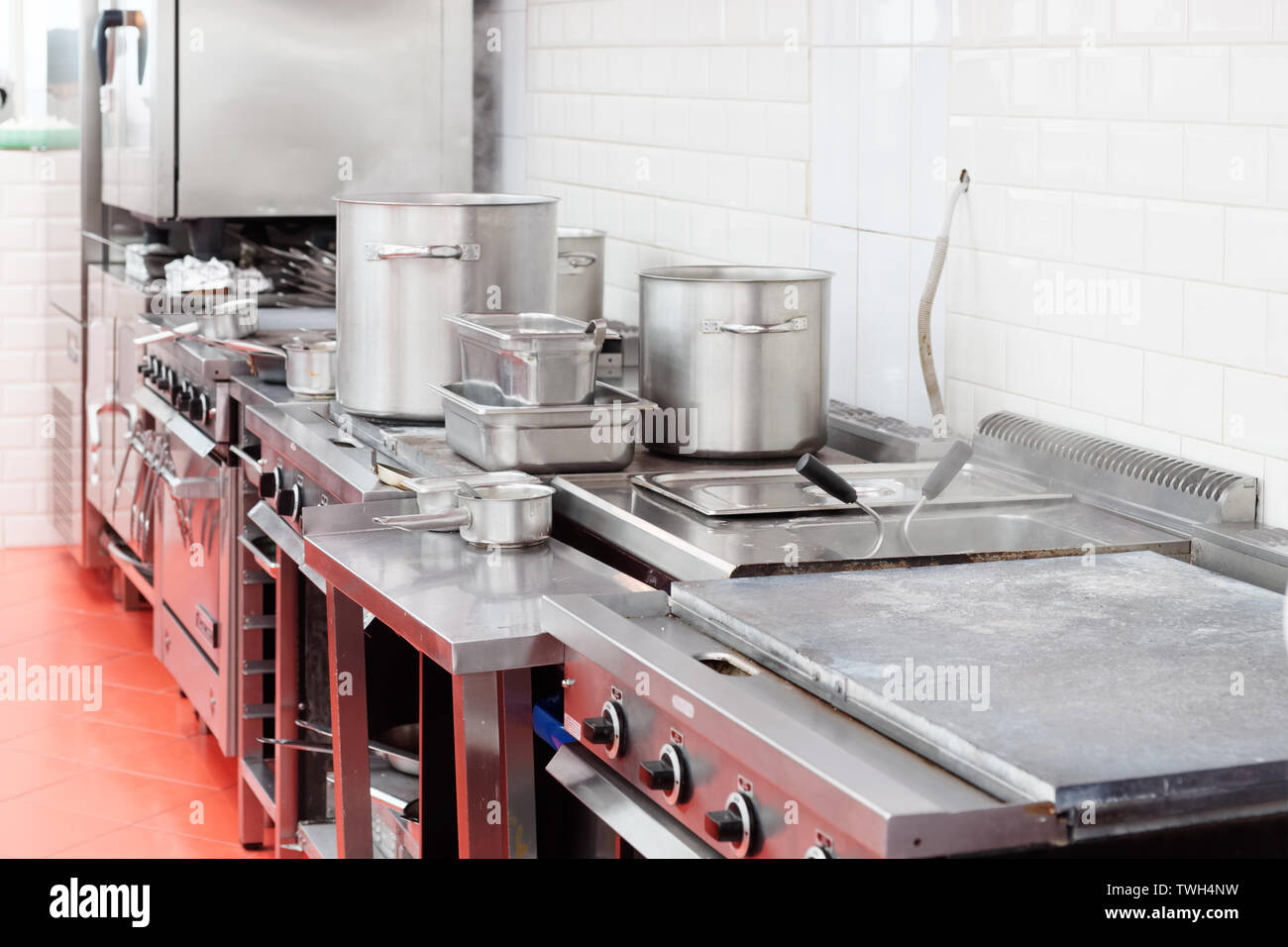 Typical kitchen of a restaurant shot in operation Stock Photo - Alamy