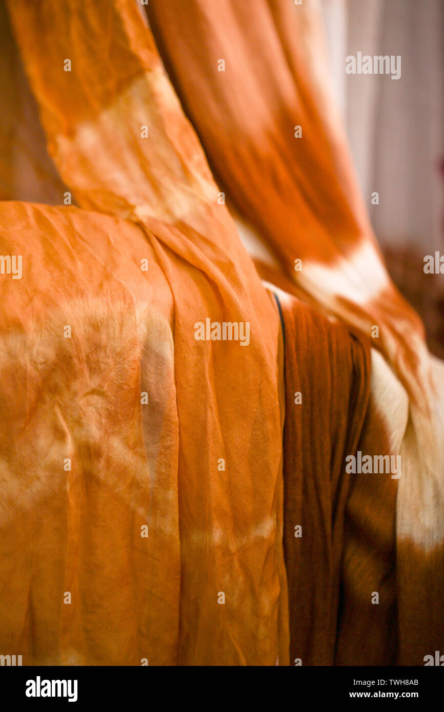 Hand stroking soft silk and fabric Stock Photo - Alamy