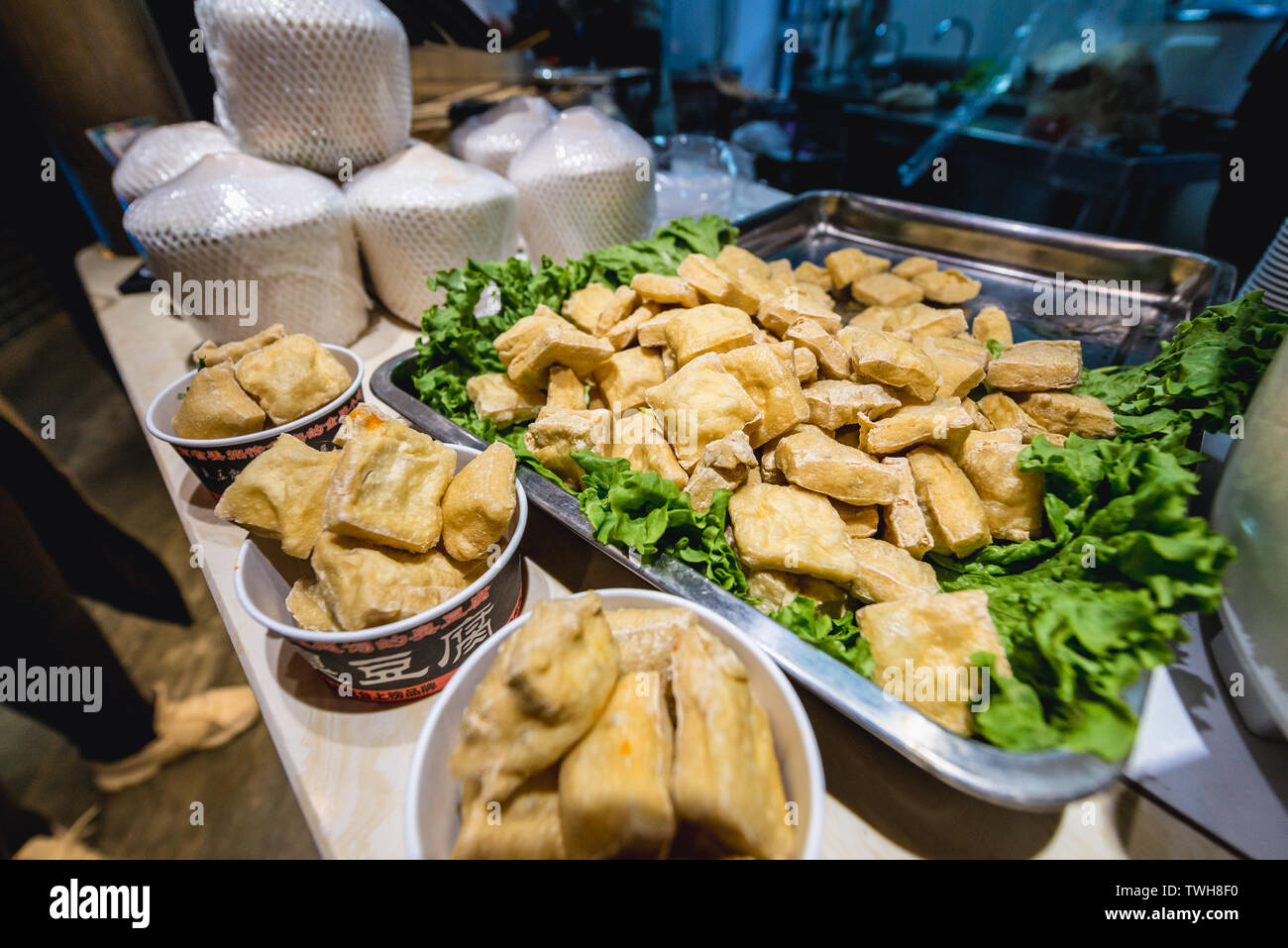 Indoor food stand on Qianmen Street in Beijing, China Stock Photo - Alamy