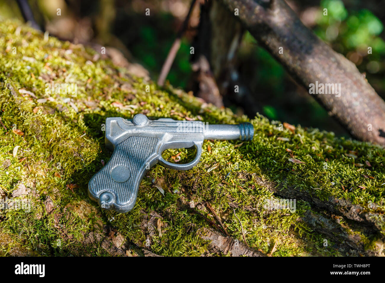 Metal toy gun hi-res stock photography and images - Alamy