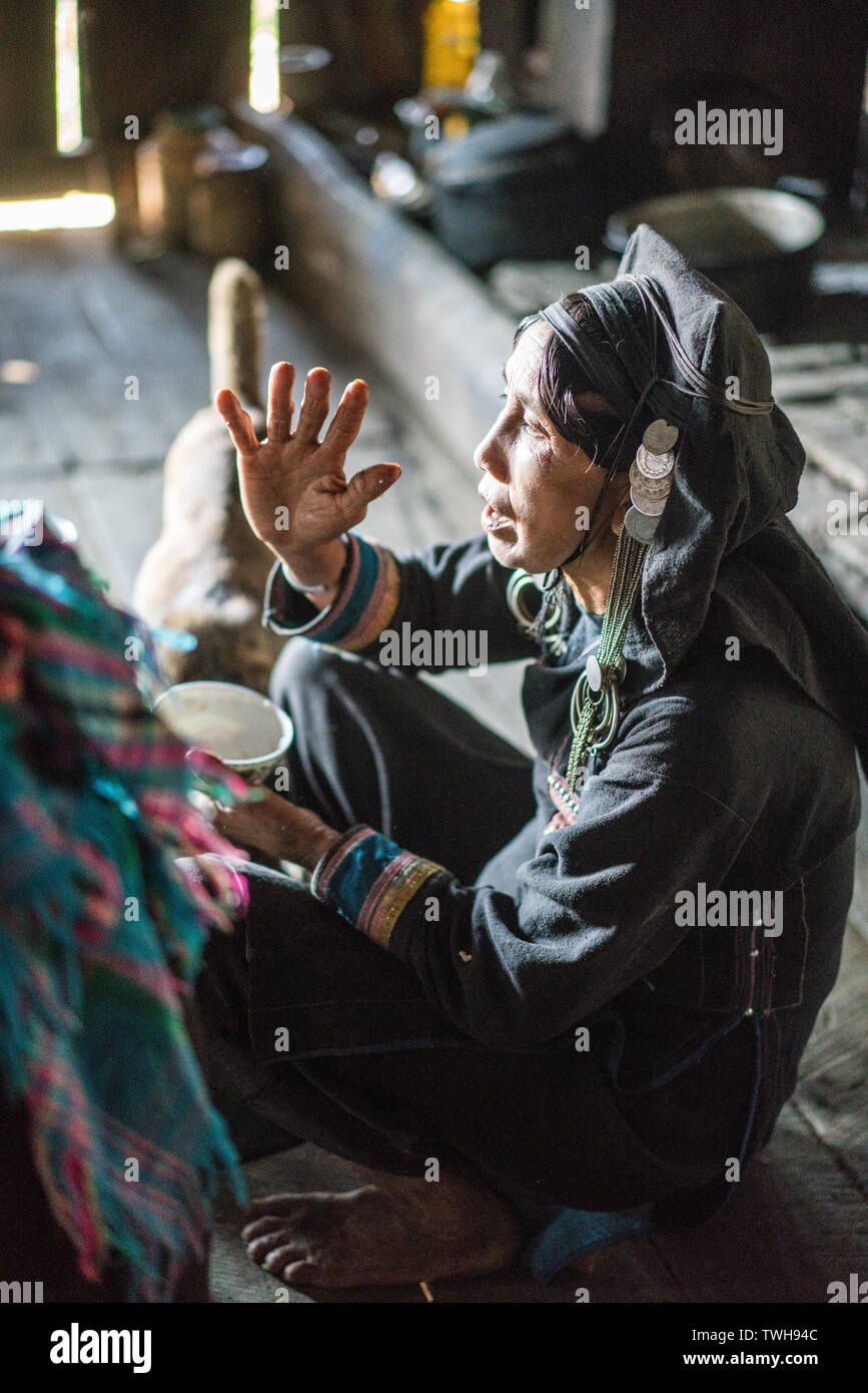 women Akha Pixor ethnicity and their childrens have lunch in the ...