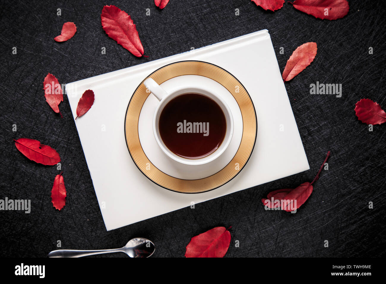 Intense coffee and coffee beans Stock Photo - Alamy