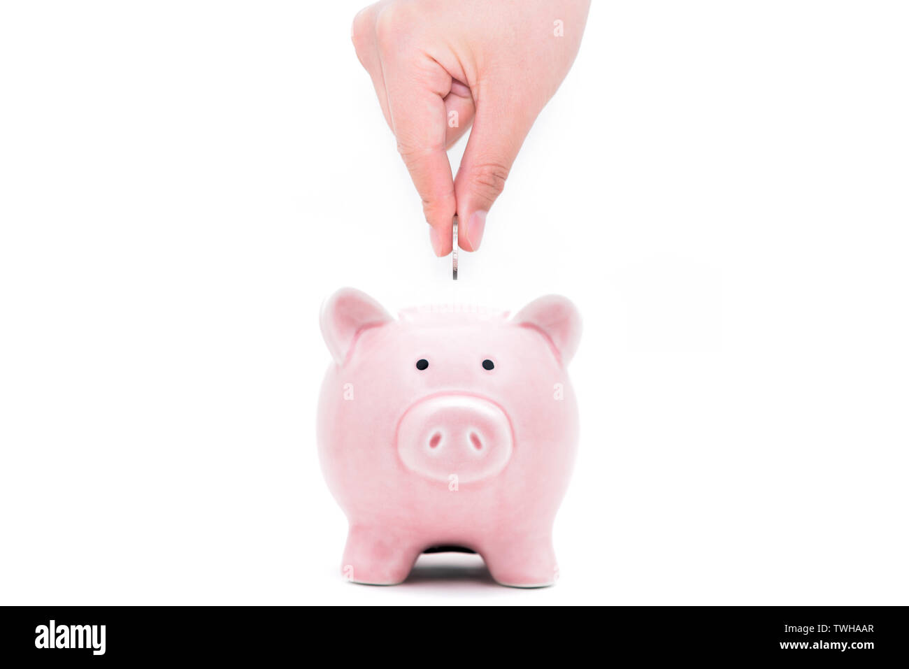 Savings pots, coins and hands in white background Stock Photo - Alamy