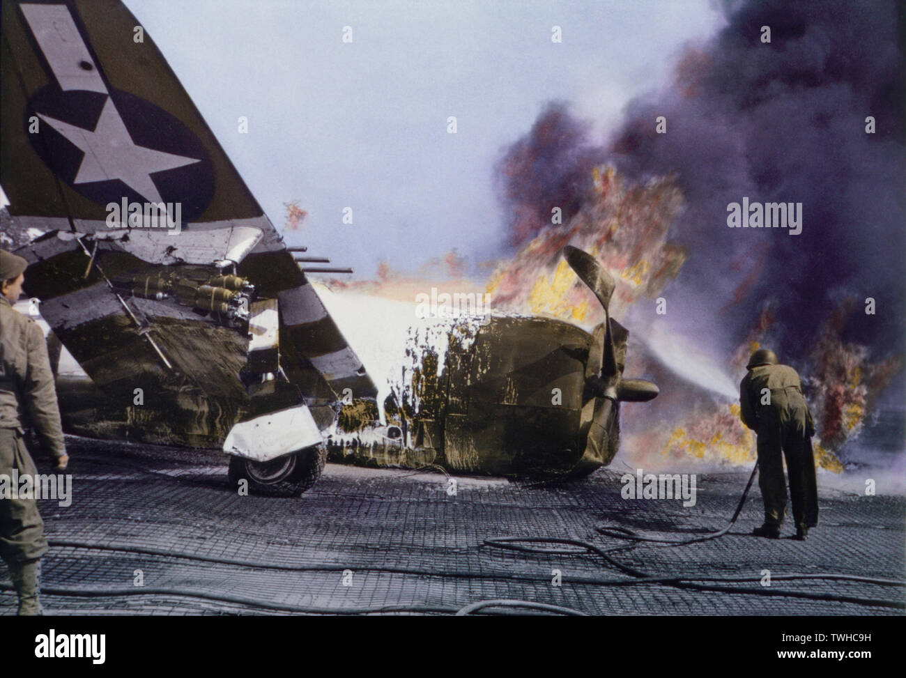 U.S. Soldier trying to Extinguish Flames of Burning Republic P-47 ...
