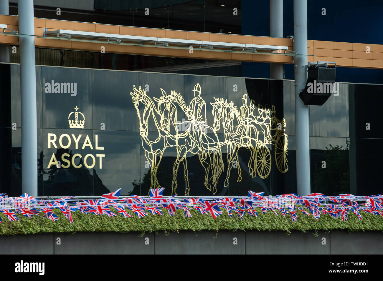 Ascot, Berkshire, UK. 20th June, 2019. Union Jacks flutter in the wind ...