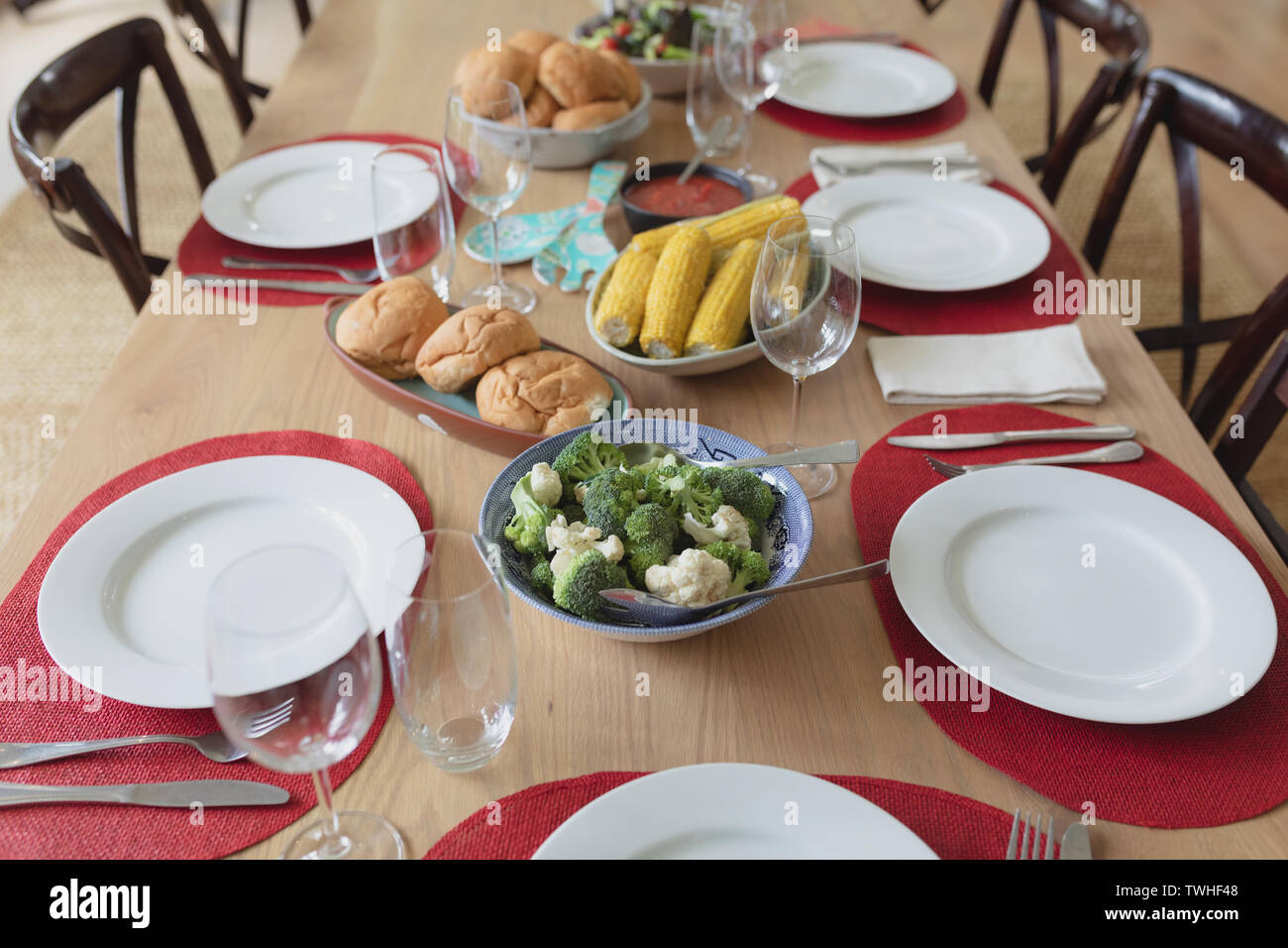 Food served on a dining table at home Stock Photo - Alamy