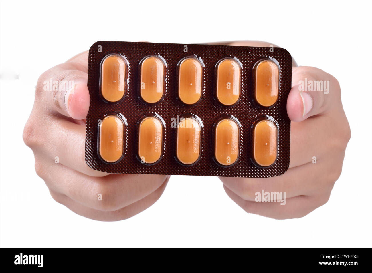 medicine in female hand isolated on white background Stock Photo - Alamy