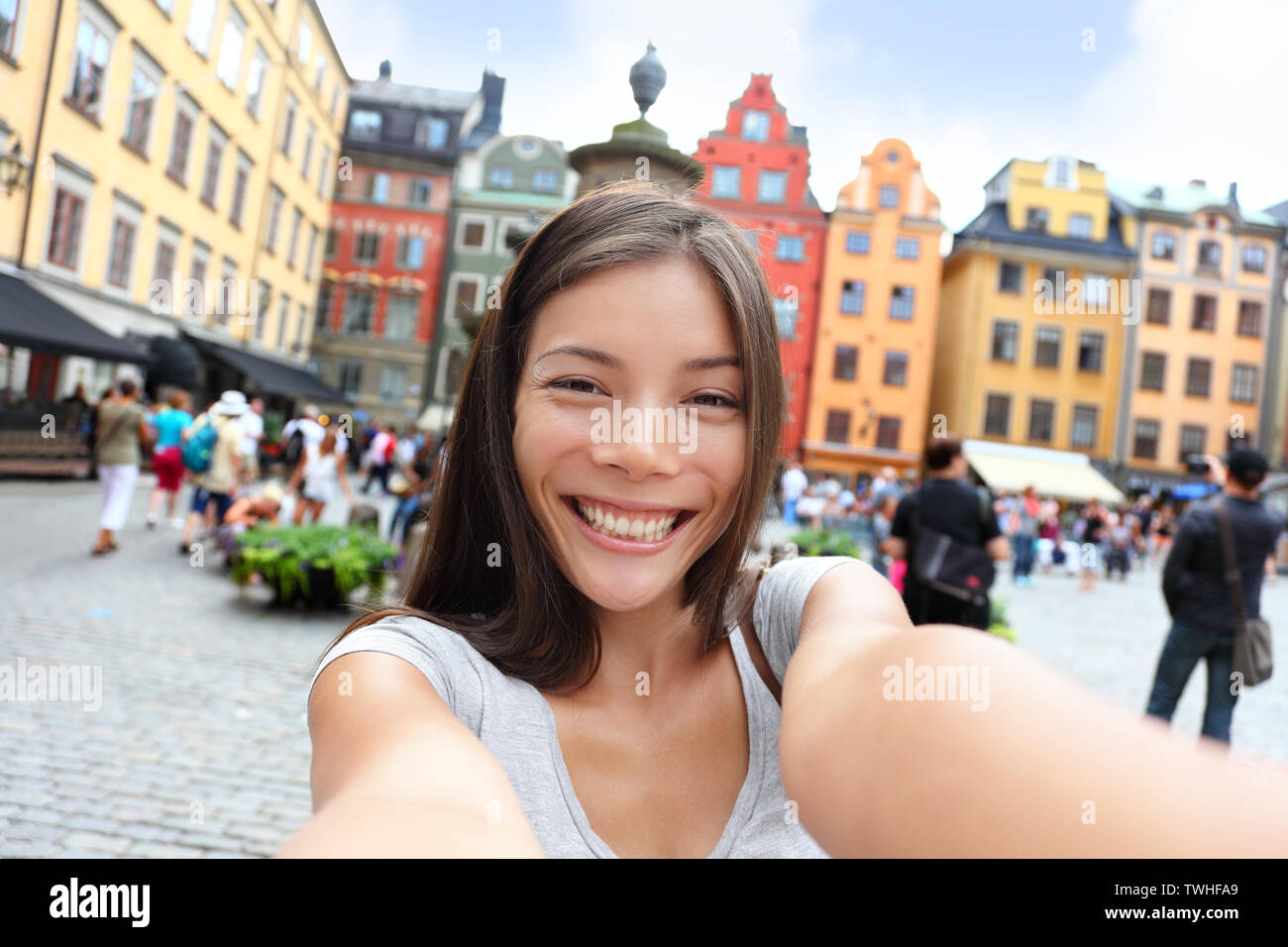 Asian woman taking self portrait selfie photo on Europe travel. Happy ...