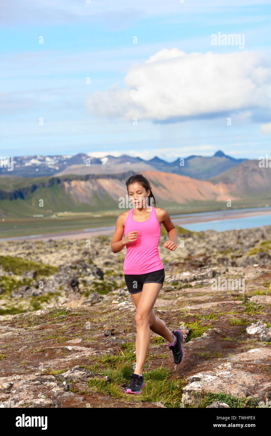 Athlete runner woman running in nature. Female fitness girl cross ...