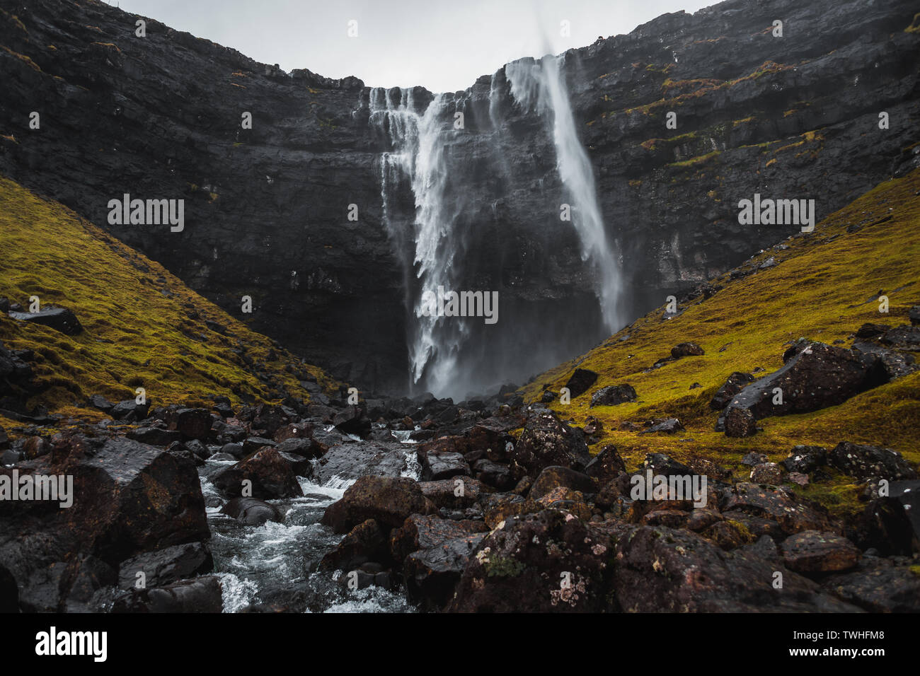 Fossa, the largest waterfall on the Faroe Islands, as seen during early ...