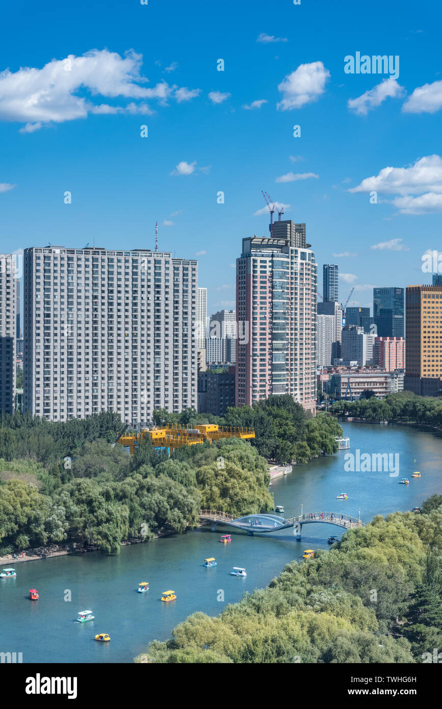 Autumn overlooking urban buildings, woods and rivers in Shenyang, China ...