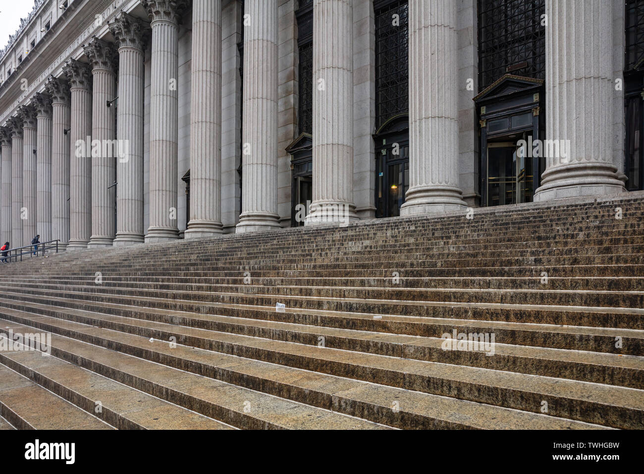 USA, New York. May 4, 2019. Stone colonnade and stairs detail ...