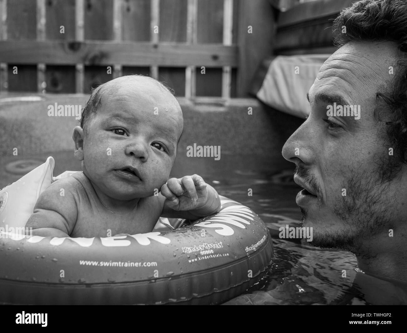 Newborn Baby in Bath with Parent Stock Photo - Alamy