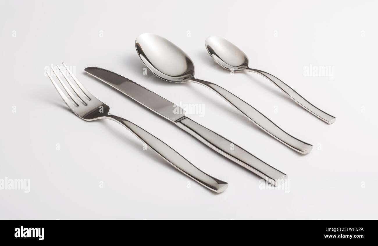 Set of Western food tableware on white background, knife, fork and ...