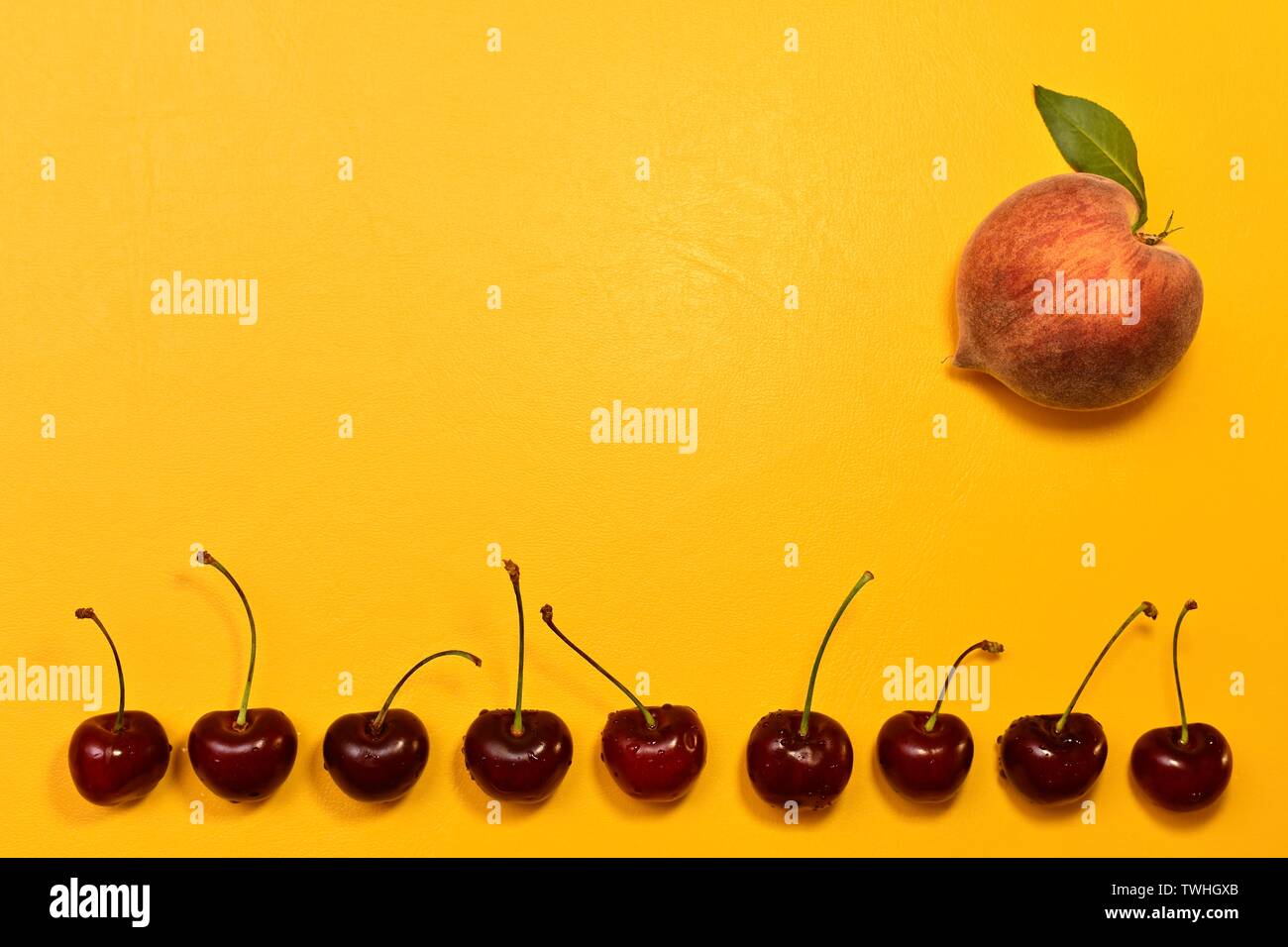 Row of nine cherries hi-res stock photography and images - Alamy