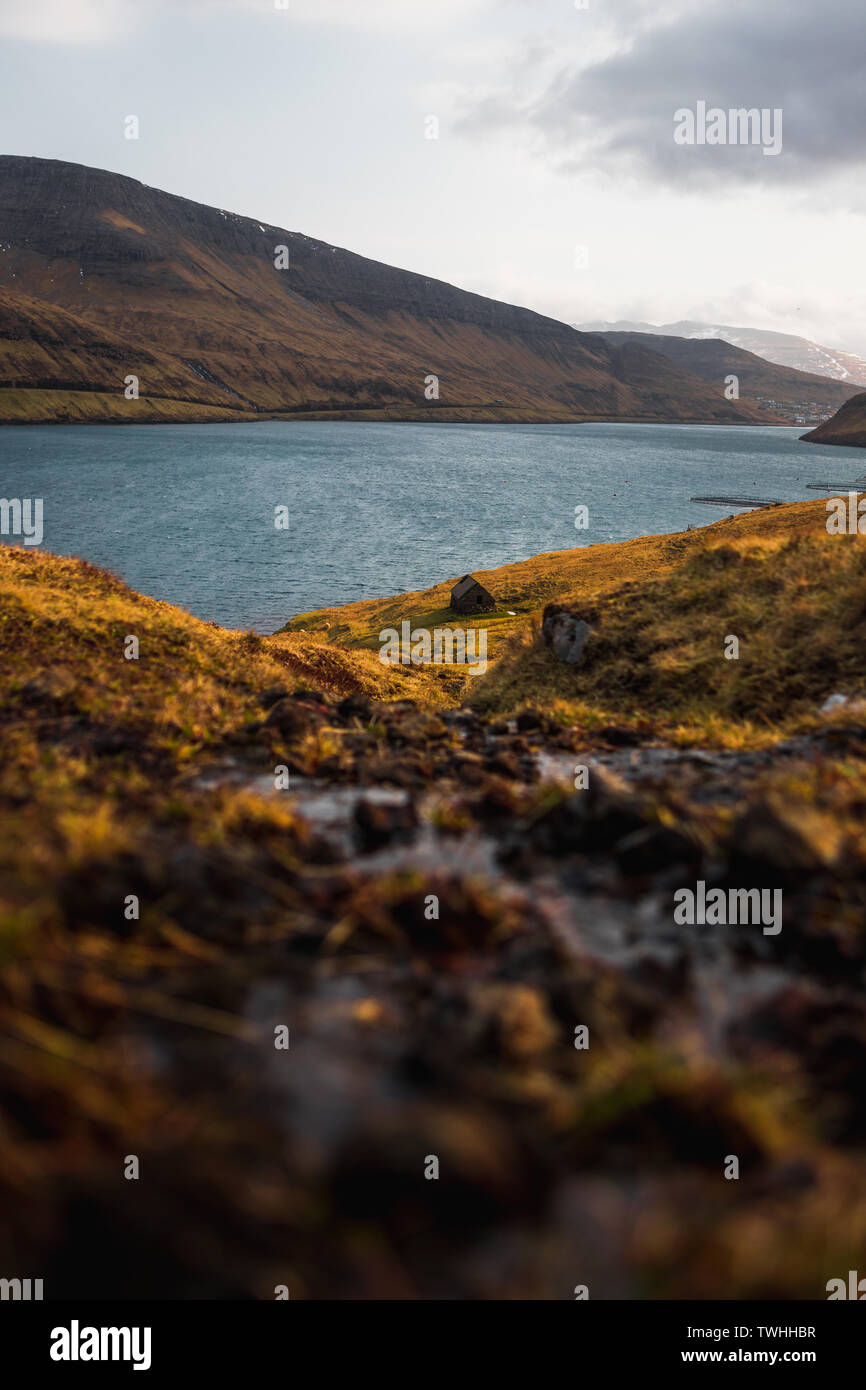 Little old fisher cabin spotted in Faroese fjord on hiking route ...