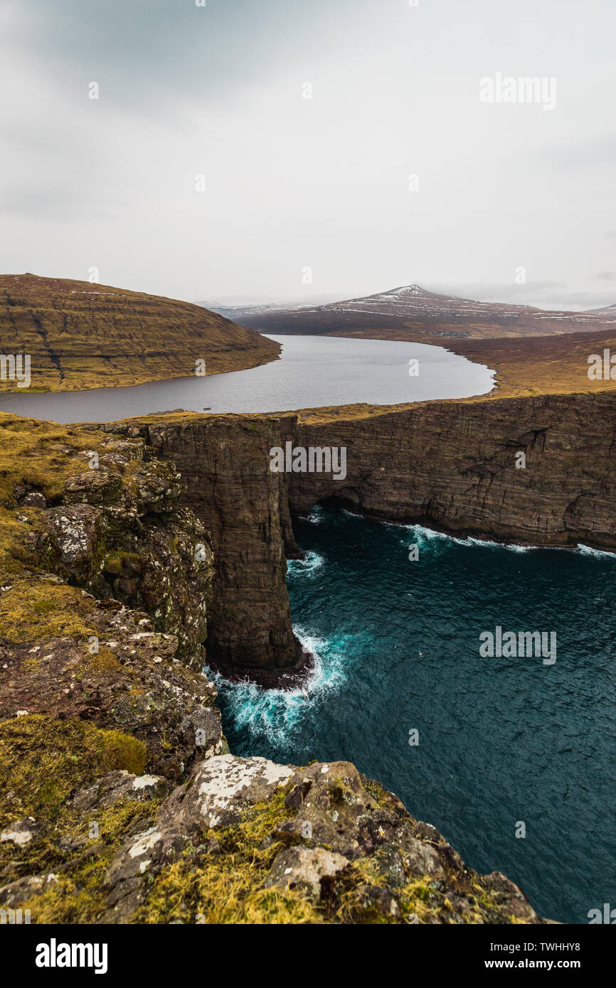 Panorama of rough cliffs at the viewpoint of famous Sorvagsvatn Lake ...