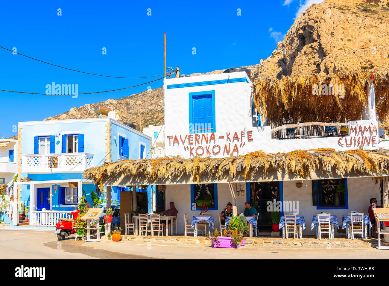 FINIKI PORT, KARPATHOS ISLAND - SEP 25, 2018: Typical Greek tavern in ...