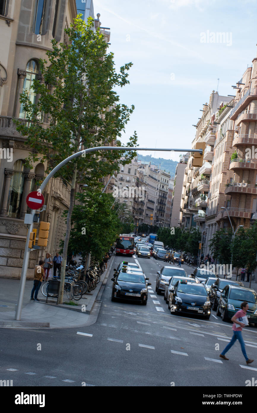 Barcelona, Spain - 26th July 2017 - Busy street with people crossing ...