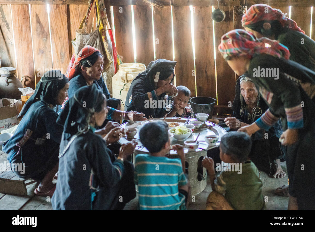 women Akha Pixor ethnicity and their childrens have lunch in the ...