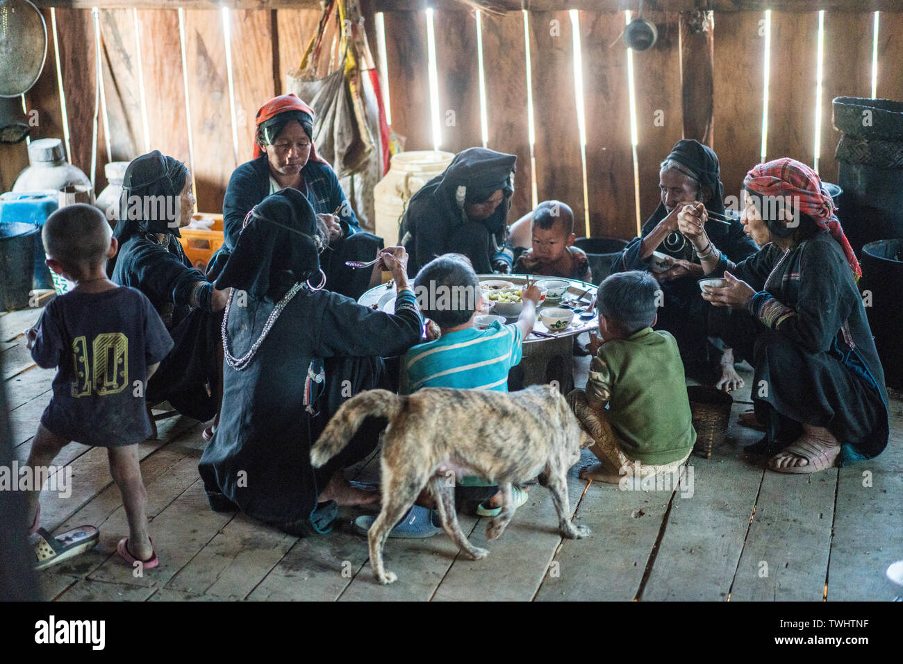 women Akha Pixor ethnicity and their childrens have lunch in the ...