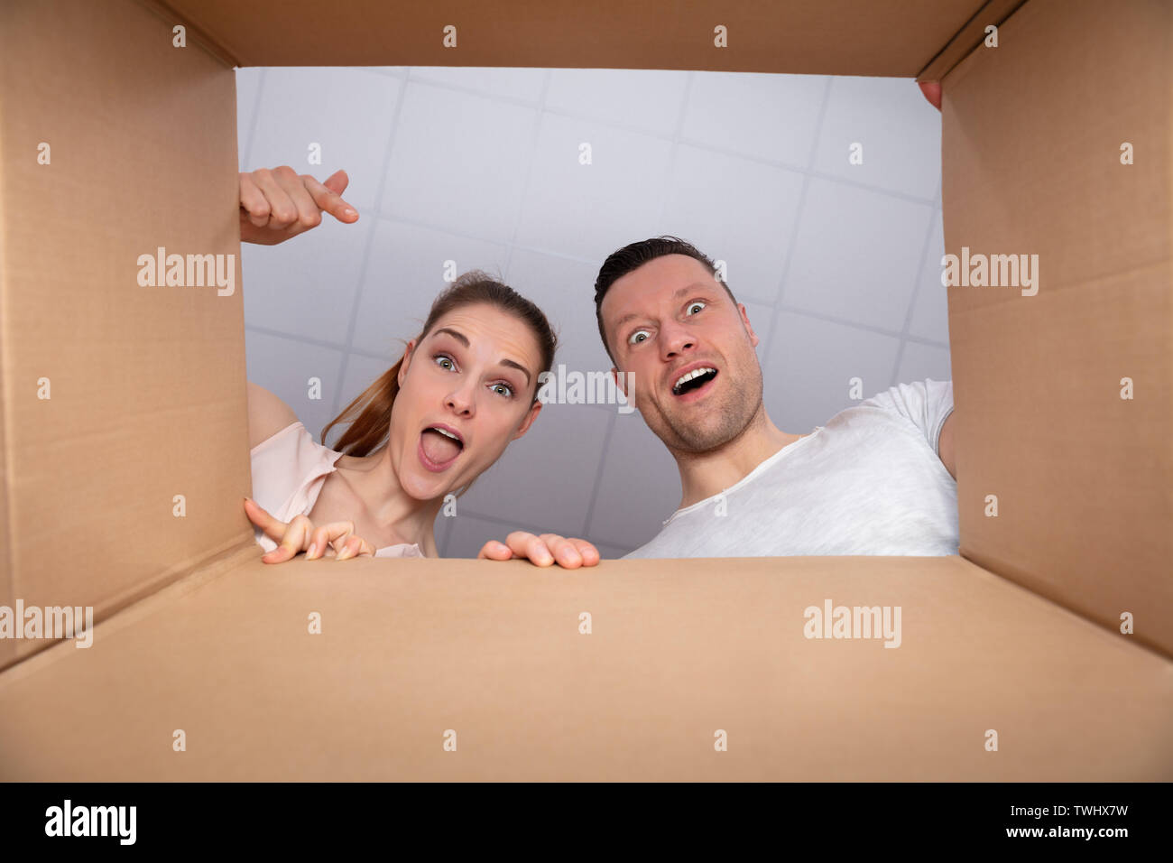Woman face inside cardboard box hi-res stock photography and images - Alamy
