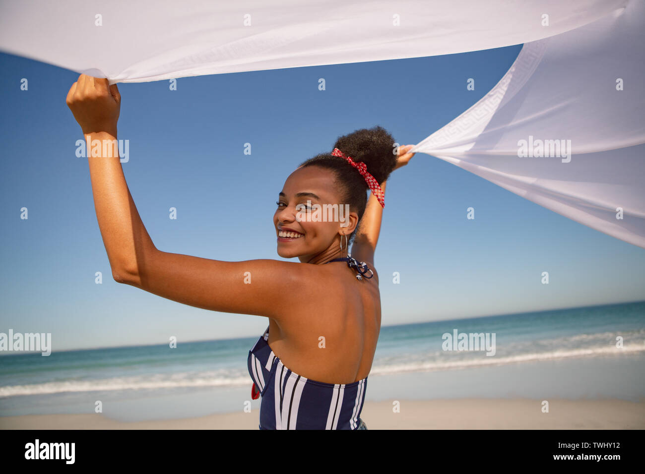Waving man on beach hi-res stock photography and images - Alamy