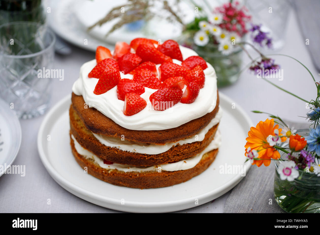 Scandinavian midsummer feast with strawberry cake Stock Photo - Alamy