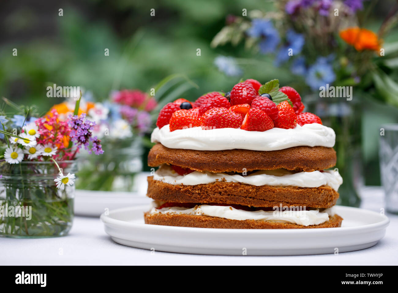 Scandinavian midsummer feast with strawberry cake Stock Photo - Alamy