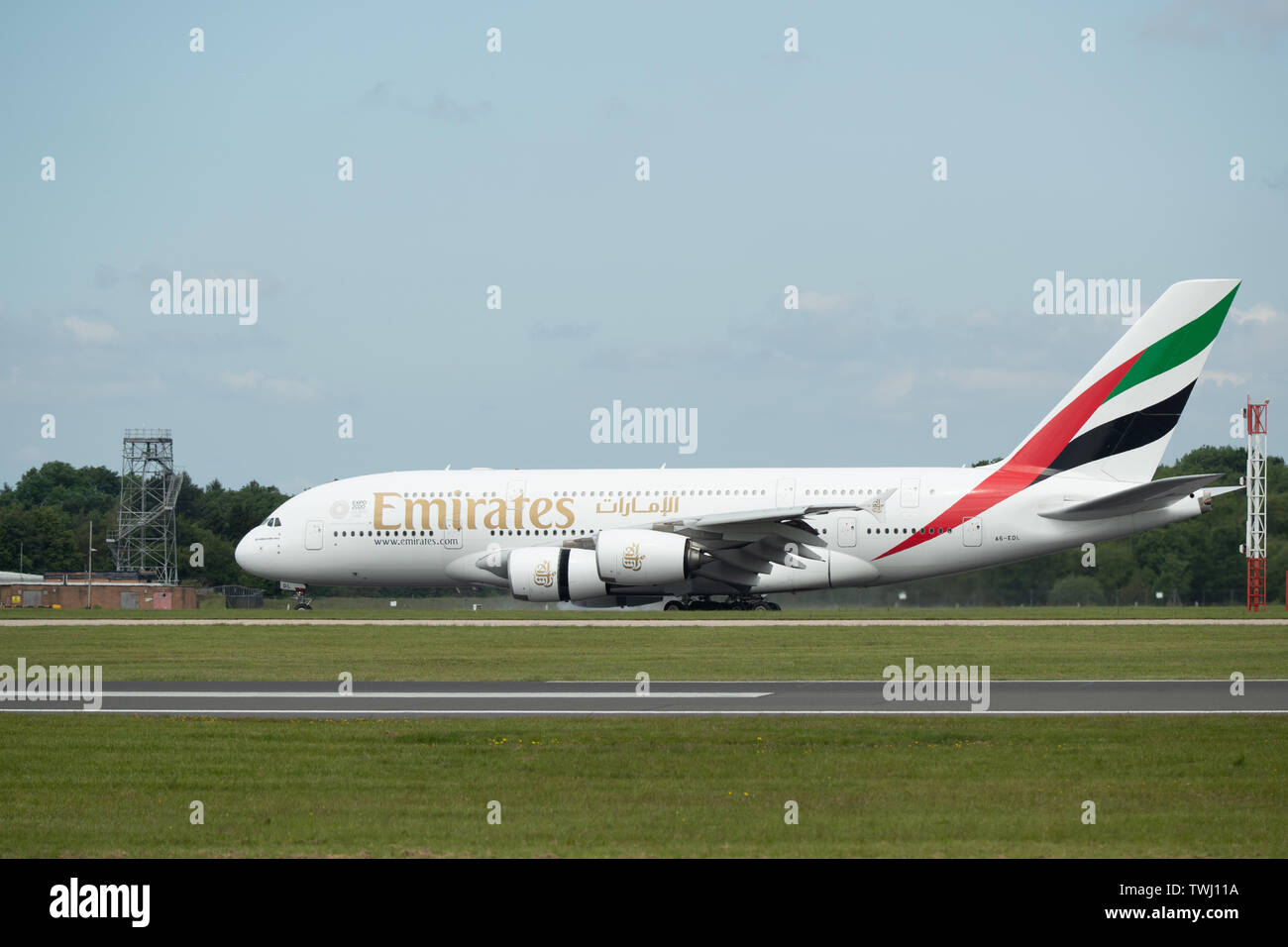 An Emirates Airways Airbus A380 taxis to the terminal building at ...